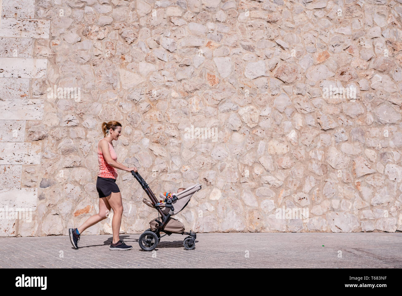 Woman stroller fitness hi-res stock photography and images - Alamy