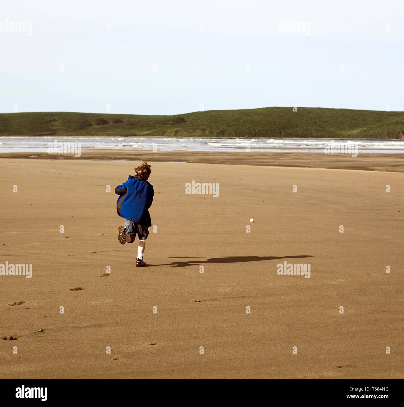 Children running after ball hi-res stock photography and images - Alamy