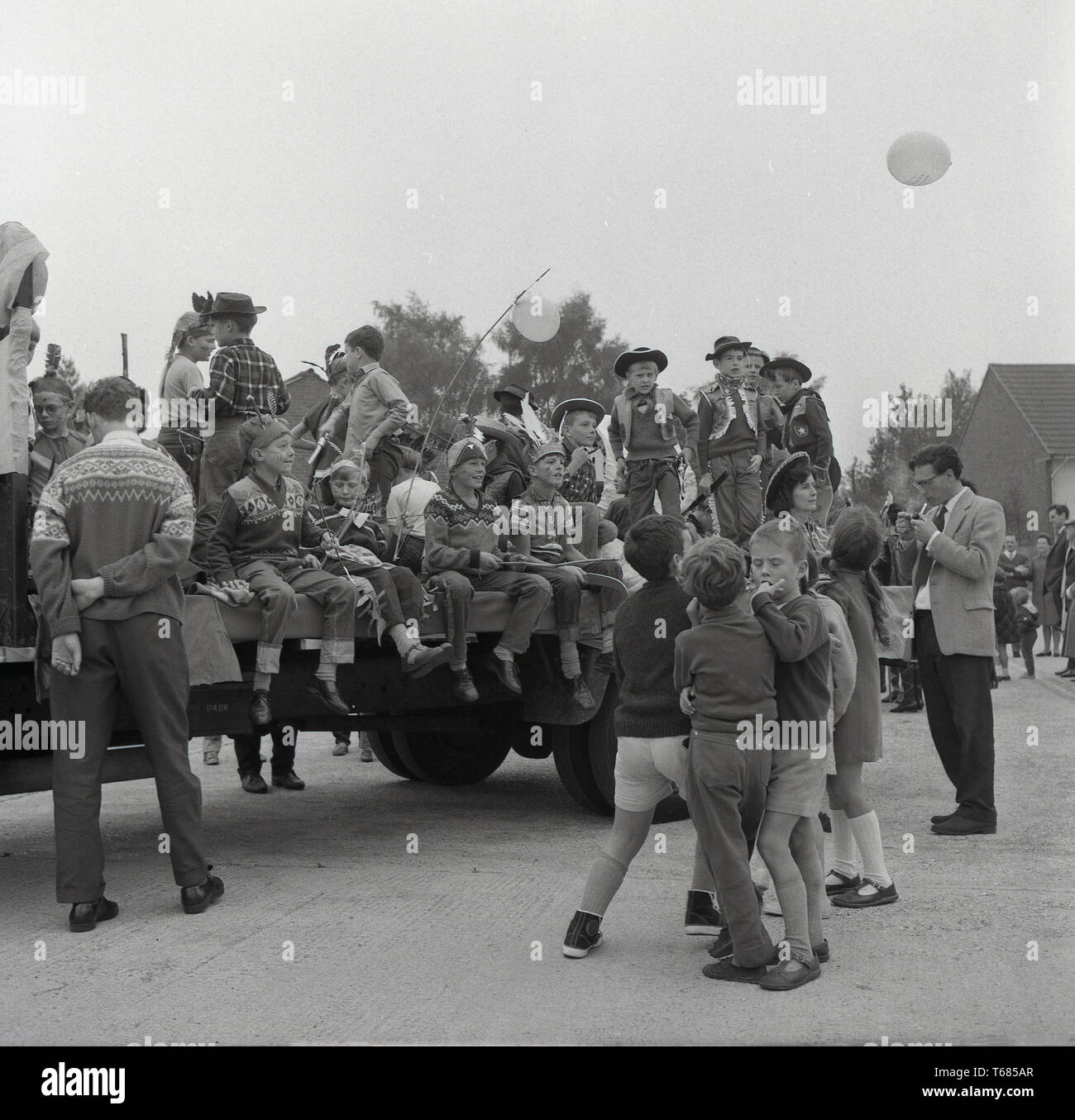 1967, historical, group of young boys dressed as cowboys and indians ...