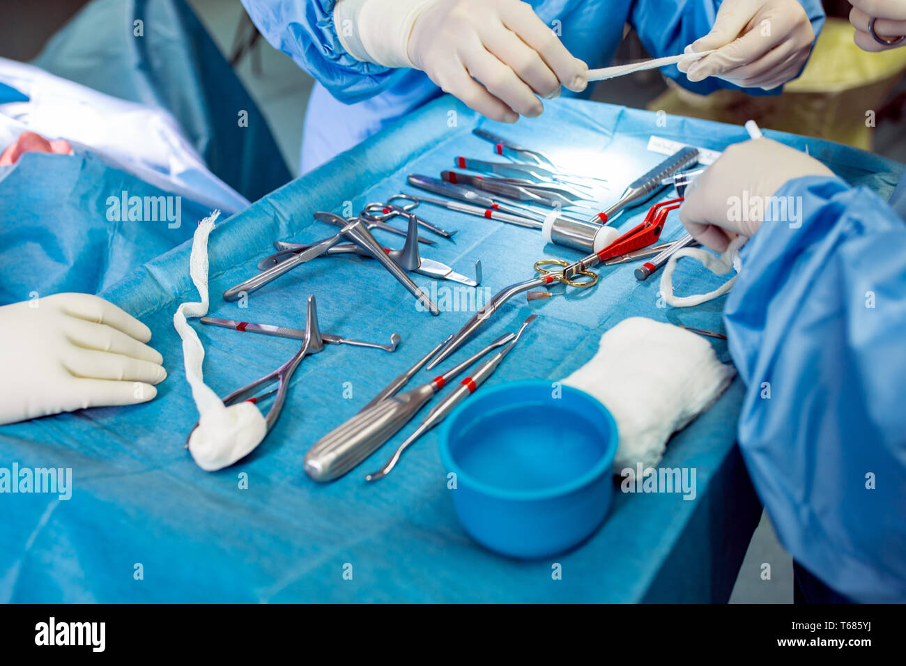 Close up of doctor hands during surgery in operation room. Sterile ...
