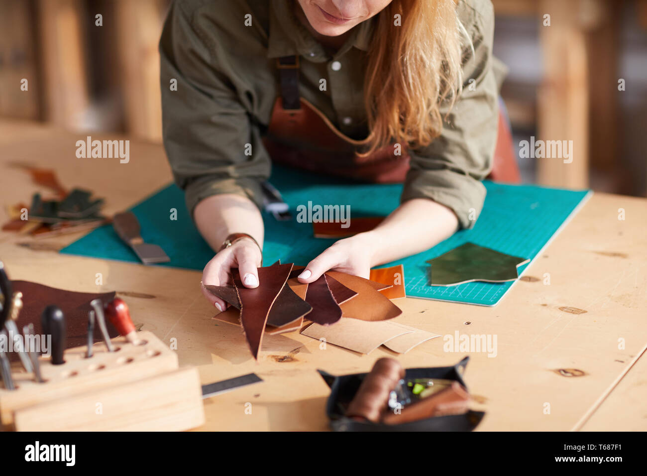 Female Leather Craftsman Stock Photo - Alamy