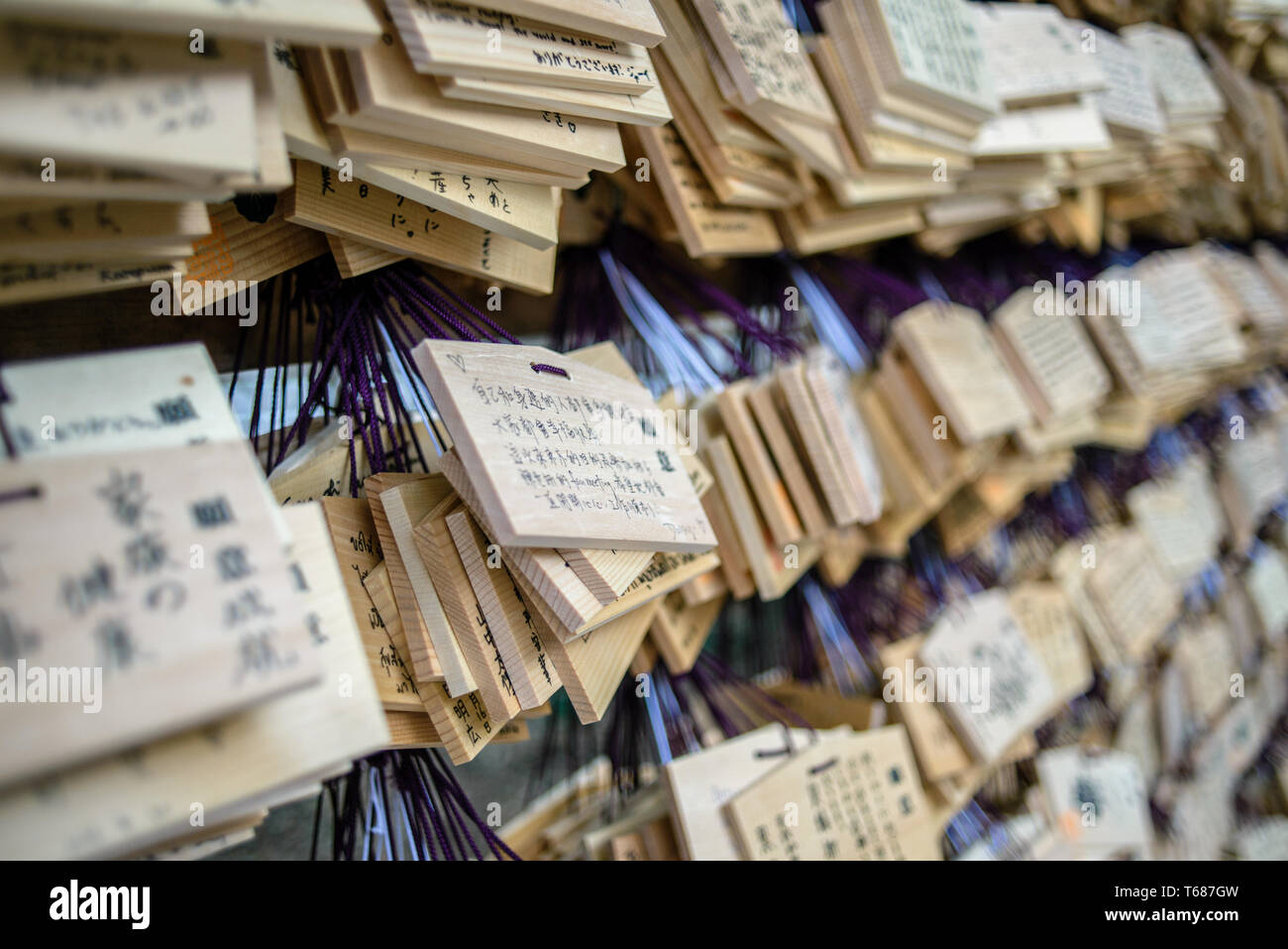 Wooden boards with wishes on display at Meiji Shrine, Yoyogi Park ...
