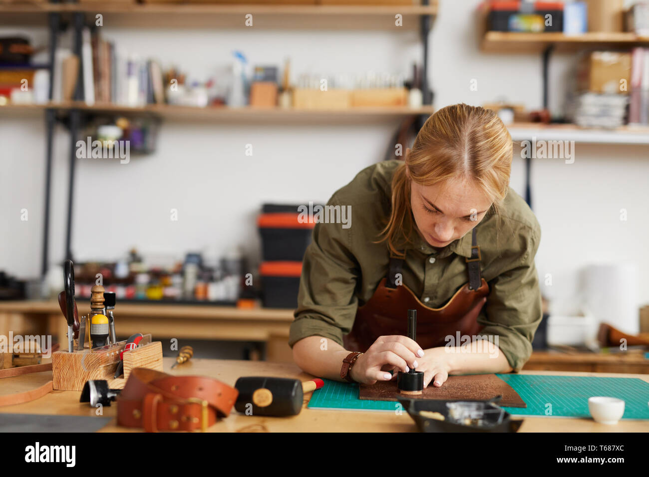 Female Tanner Working Stock Photo - Alamy