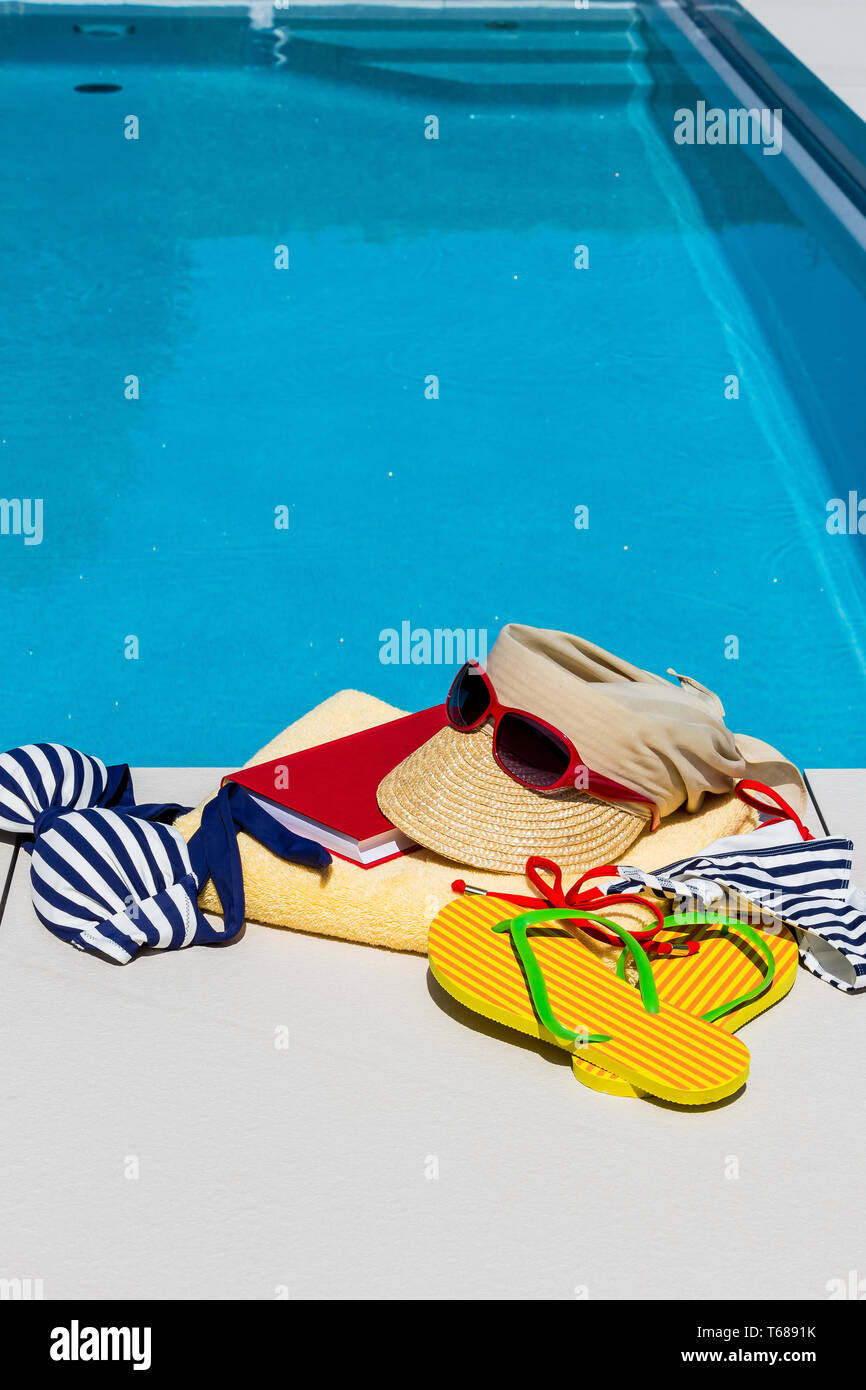 Vacation Symbol Photo of a Sun Hat at the Pool Stock Photo - Alamy