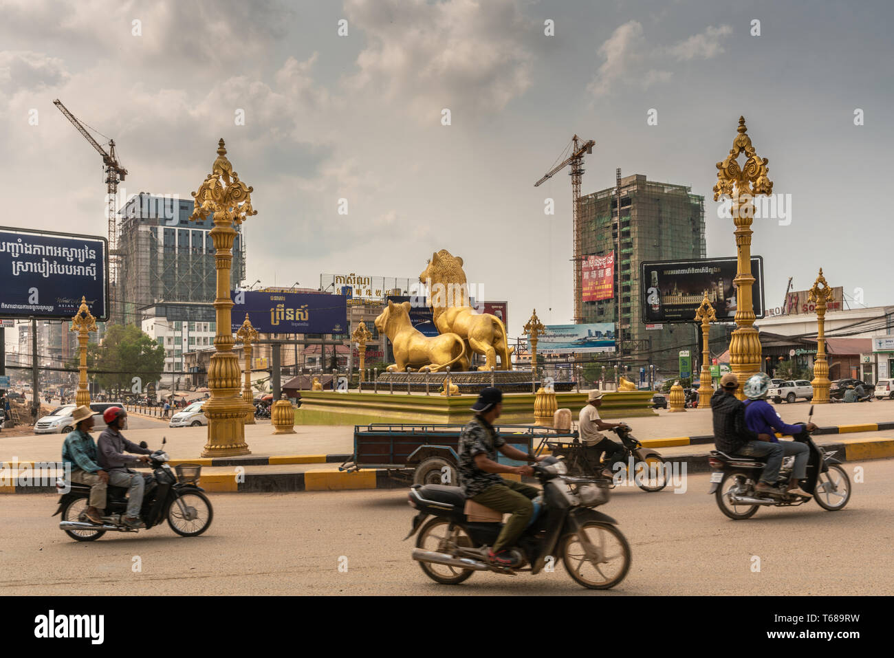 Sihanoukville, Cambodia - March 15, 2019: Motorbikes circle the Golden ...