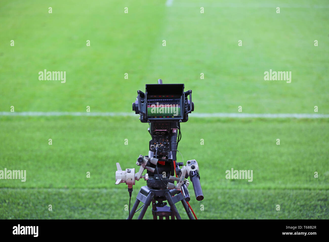 TV camera on football field Stock Photo - Alamy