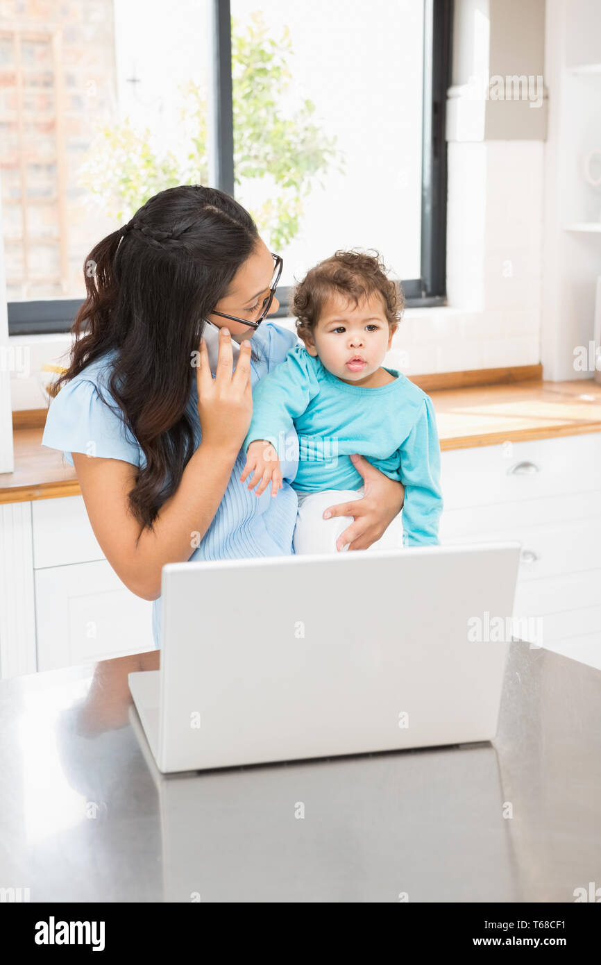 Cute baby using phone adorable hi-res stock photography and images - Alamy