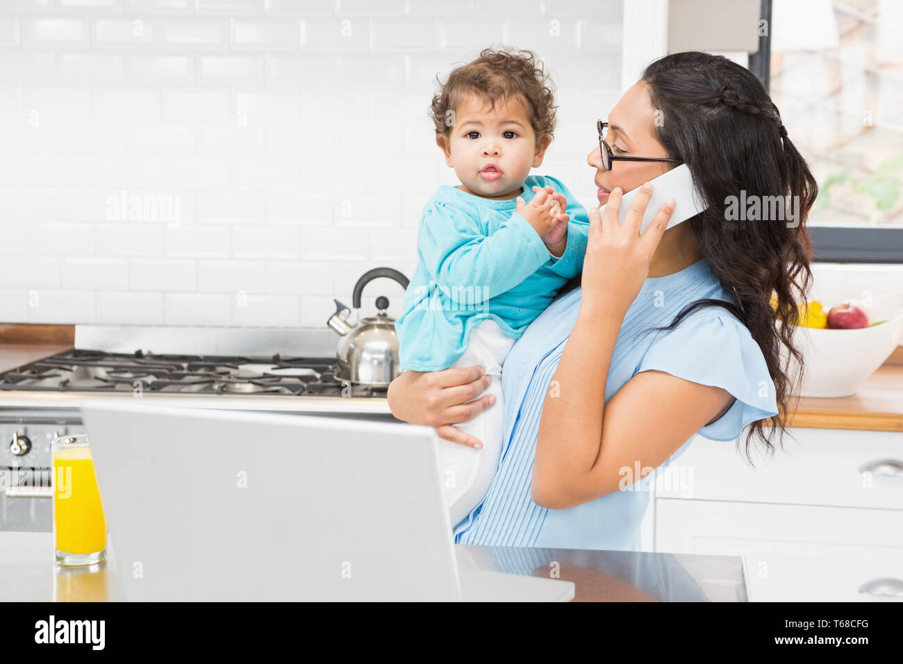 Cute baby using phone adorable hi-res stock photography and images - Alamy