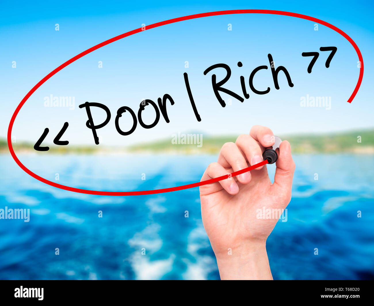 Man Hand writing Poor - Rich with black marker on visual screen Stock ...