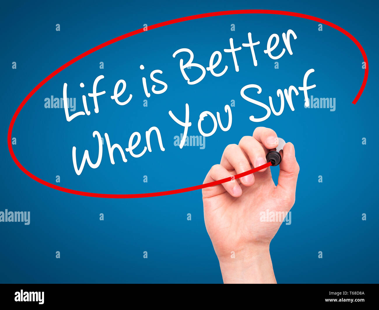 Man Hand writing Life is Better When You Surf with black marker on ...