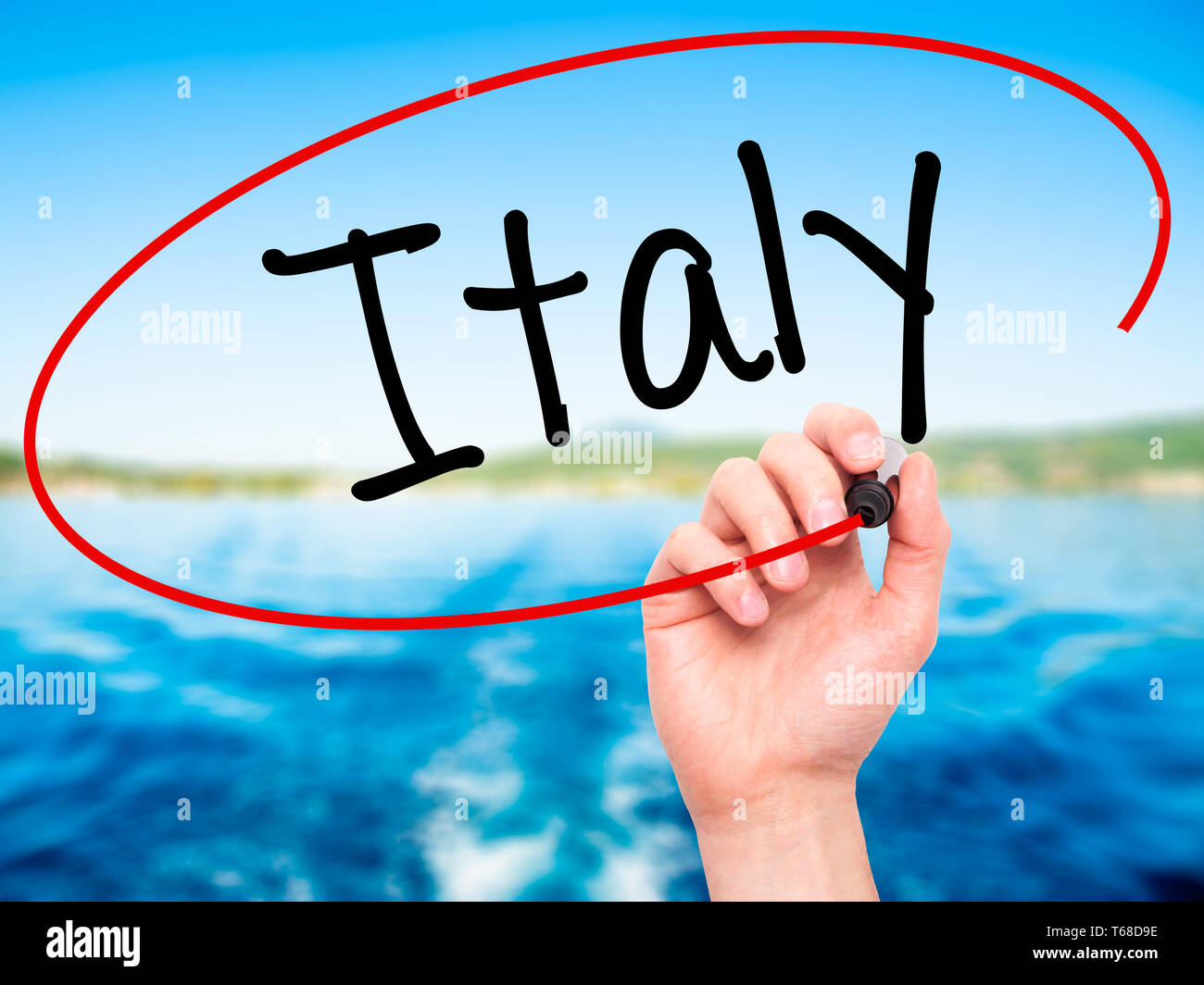 Man Hand writing Italy with black marker on visual screen Stock Photo ...