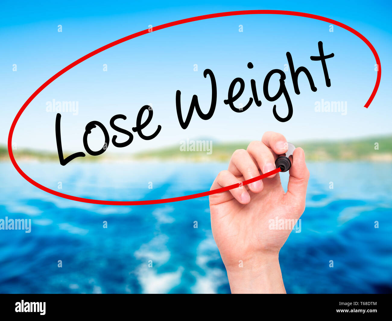 Man Hand writing Lose Weight with black marker on visual screen Stock ...