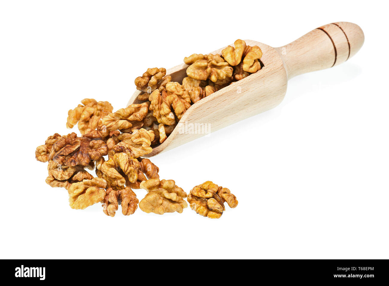 Handful of walnuts in scoop isolated on white background Stock Photo ...