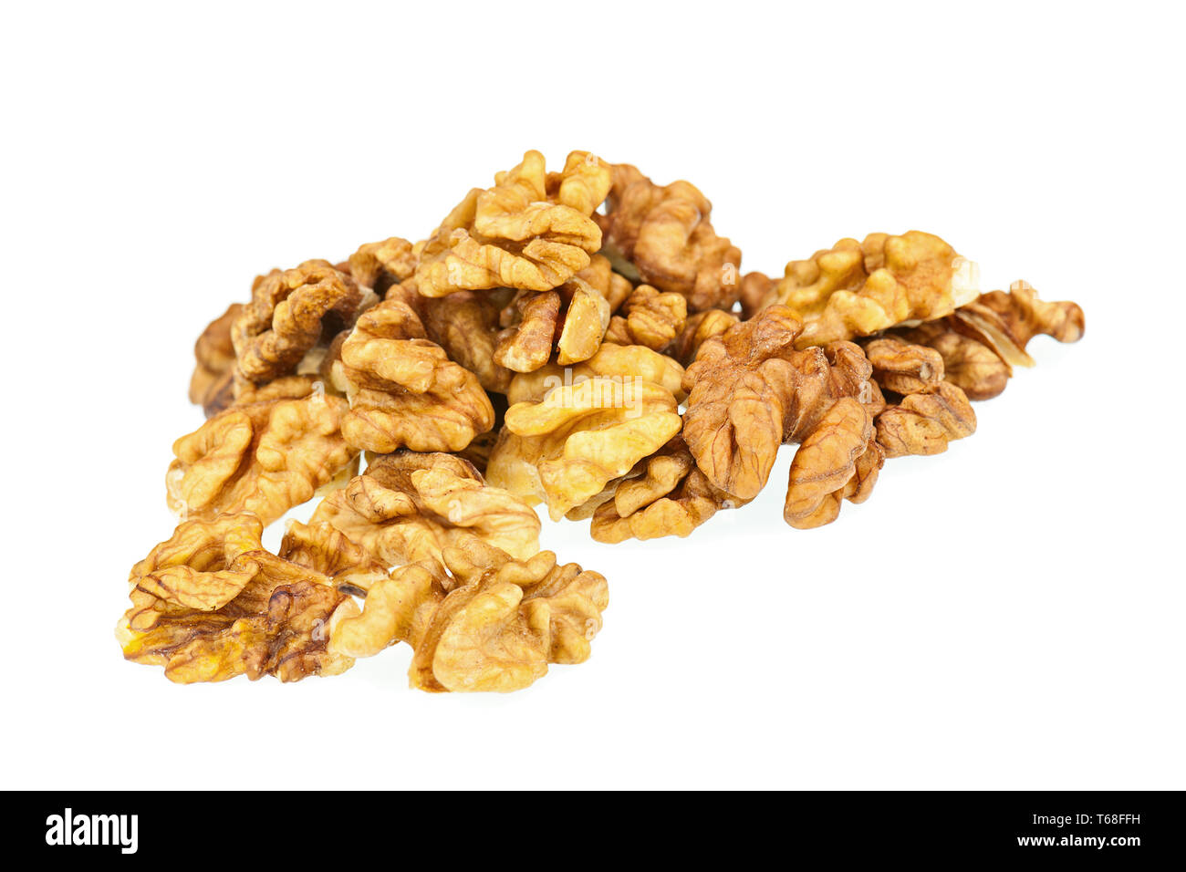 Handful of walnuts isolated on white background Stock Photo - Alamy