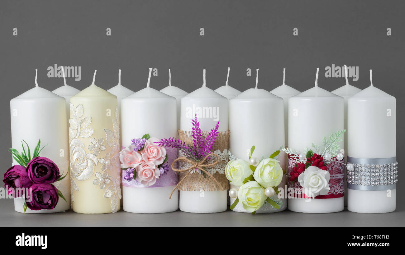 Collection of beautiful decorated candles Stock Photo - Alamy