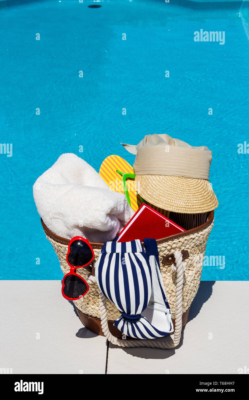 Vacation Symbol Photo of a Sun Hat at the Pool Stock Photo - Alamy