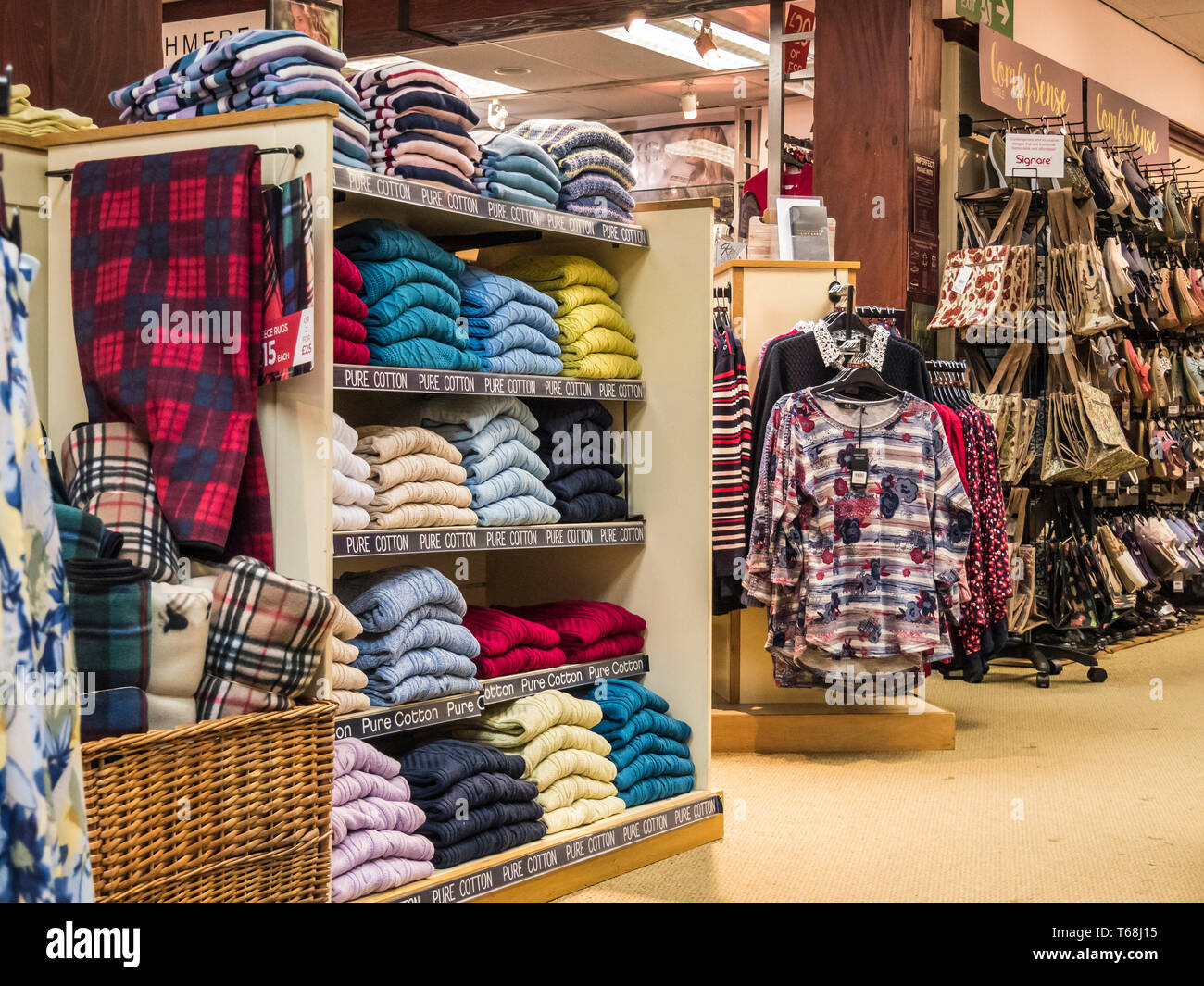 Colourful displays of mens ware on display at a town centre department ...