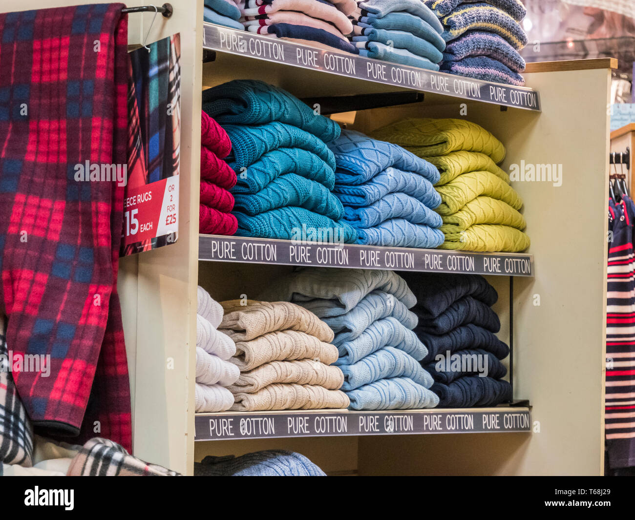 Colourful displays of mens ware on display at a town centre department ...