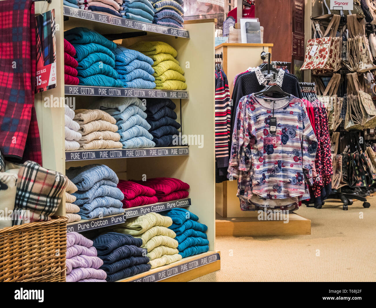 Colourful displays of mens ware on display at a town centre department ...