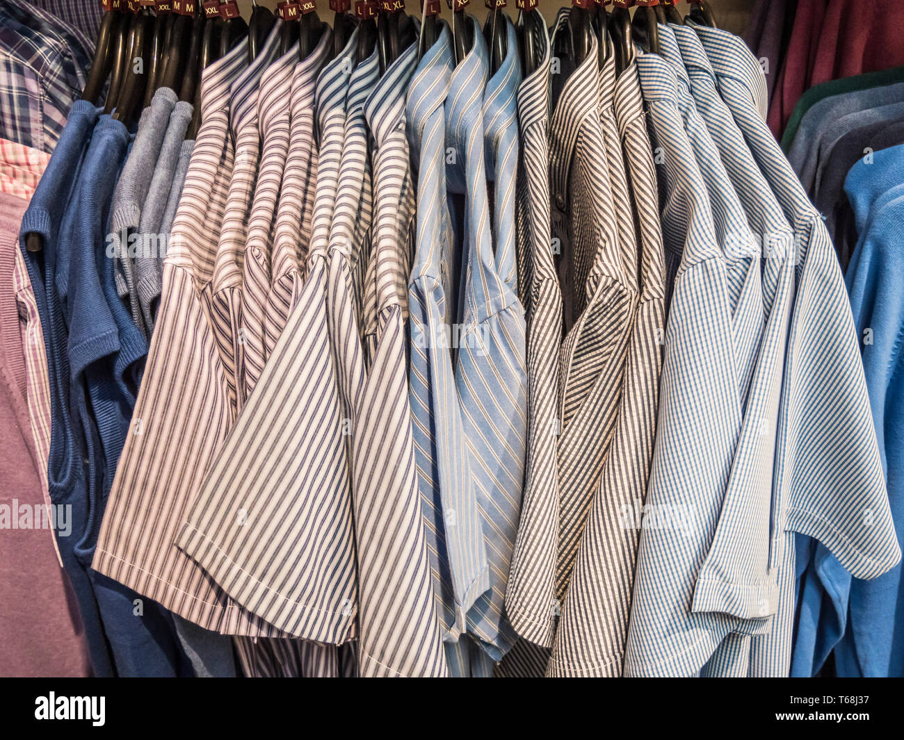 Colourful displays of mens ware on display at a town centre department ...