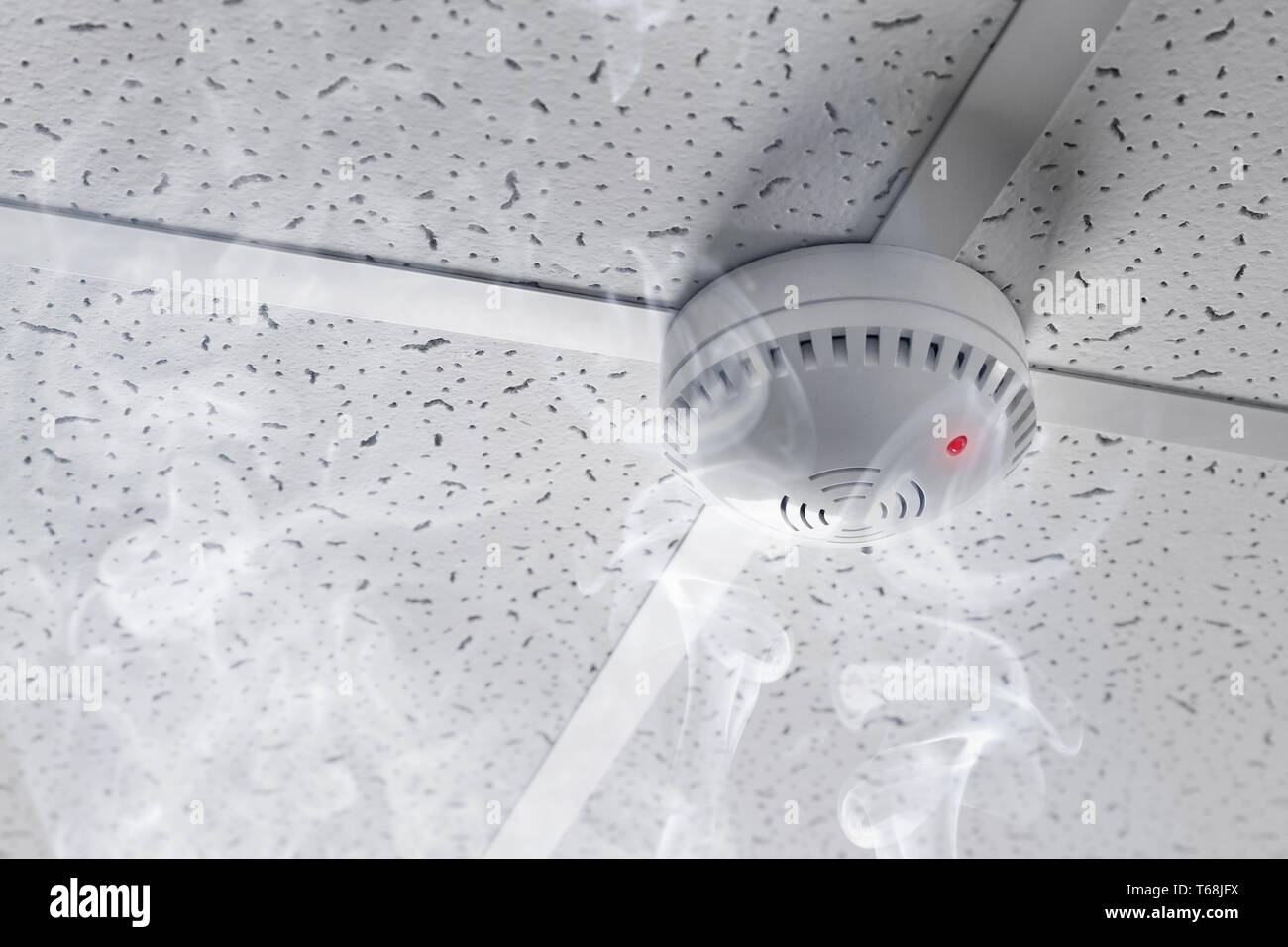 Ceiling detector with flowing smoke Stock Photo - Alamy