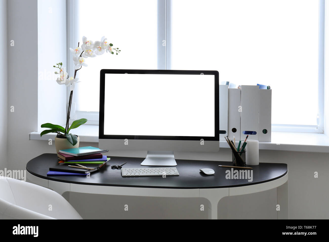 Workplace with computer on table near window Stock Photo - Alamy