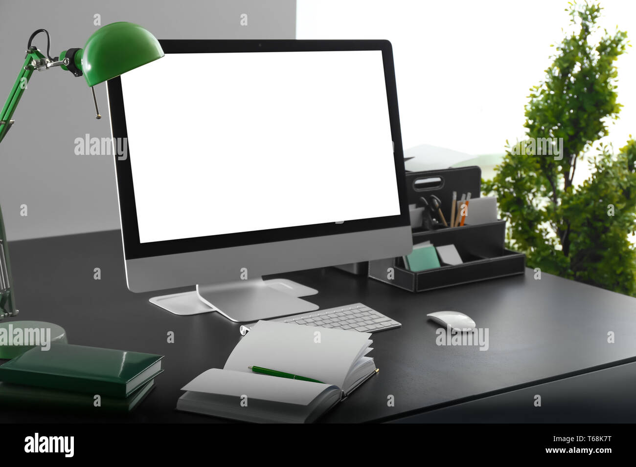 Workplace with computer on table in office Stock Photo - Alamy