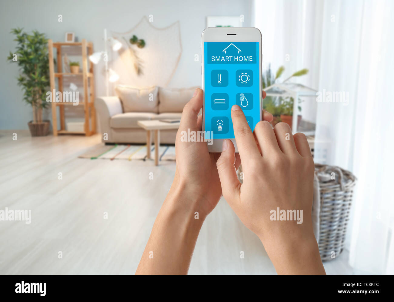 Woman plants contemporary home hi-res stock photography and images - Alamy