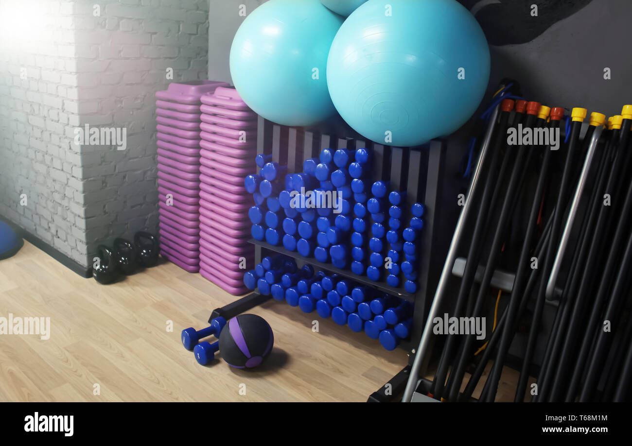 Sport equipment in modern gym Stock Photo - Alamy