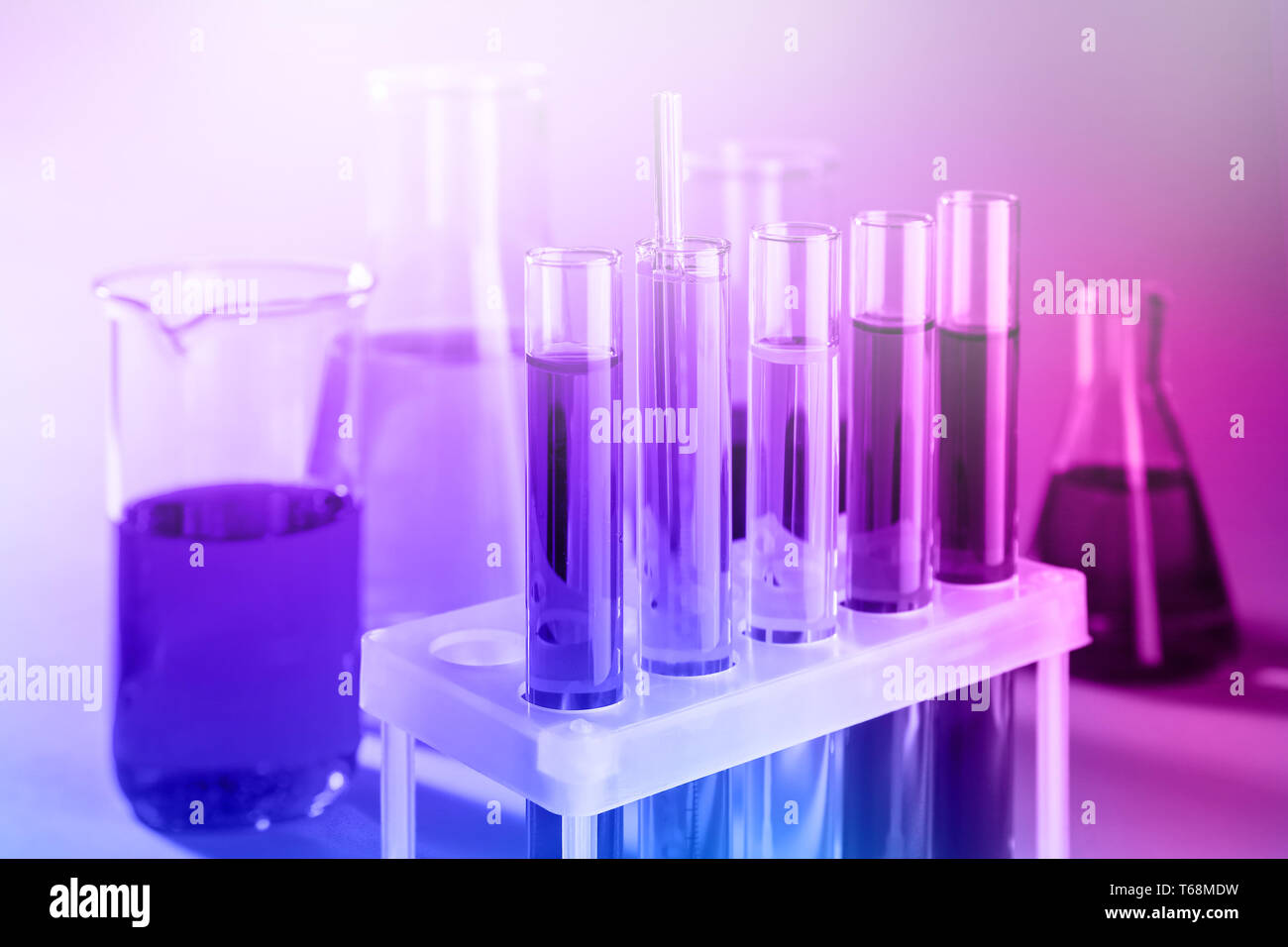 Test tubes with samples on table in laboratory Stock Photo - Alamy