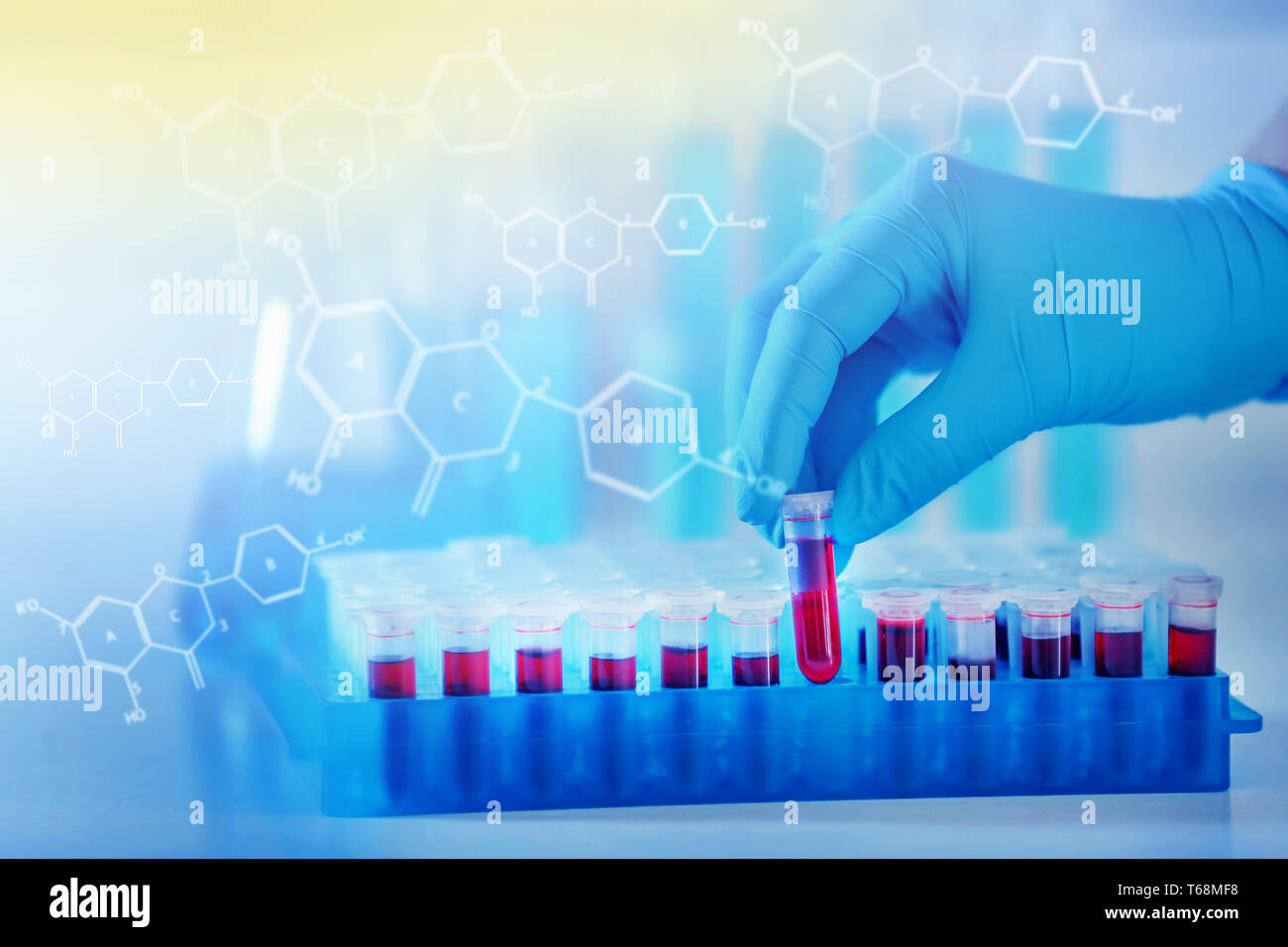 Scientist working with test tubes in laboratory Stock Photo - Alamy