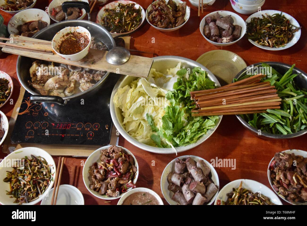 Traditional chinese meal includes many plates with different delicius ...