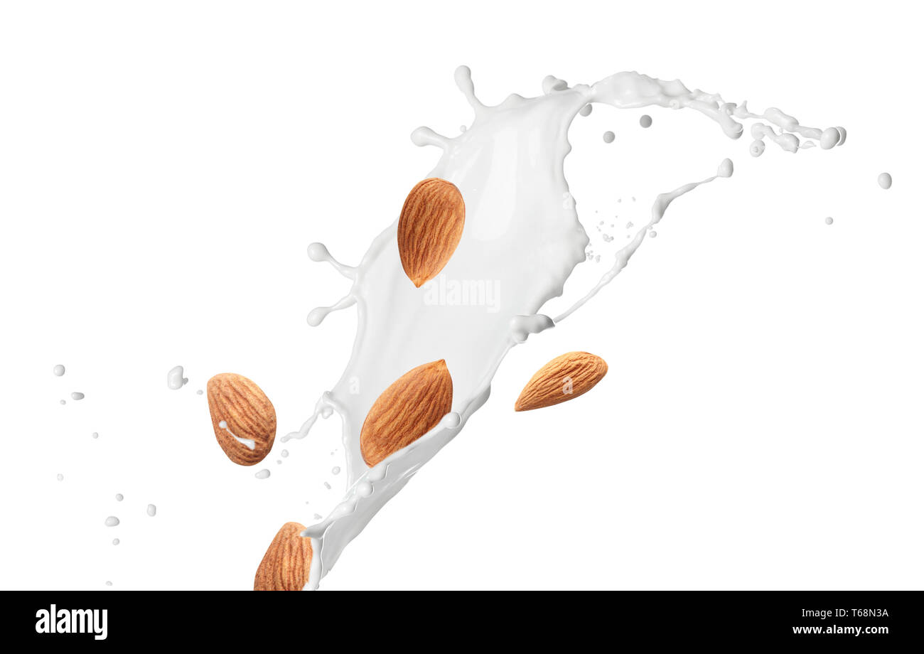 Splash of almond milk on white background Stock Photo - Alamy