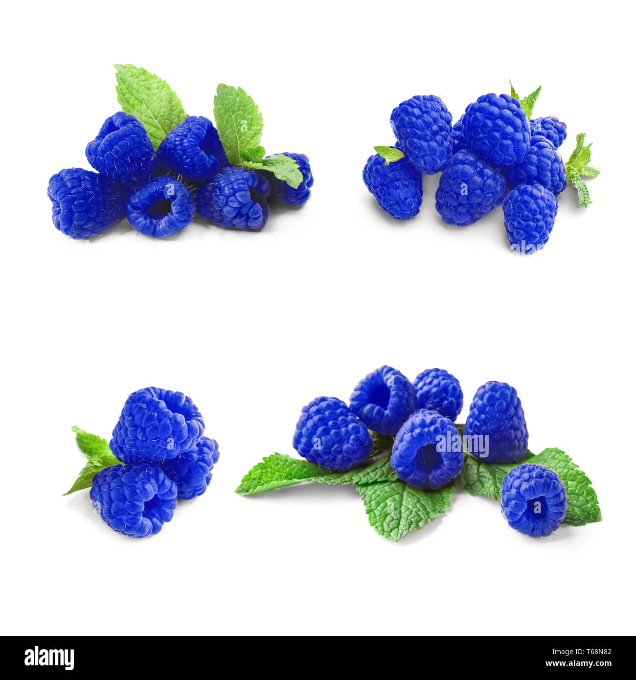 Set with fresh ripe blue raspberry on white background Stock Photo - Alamy