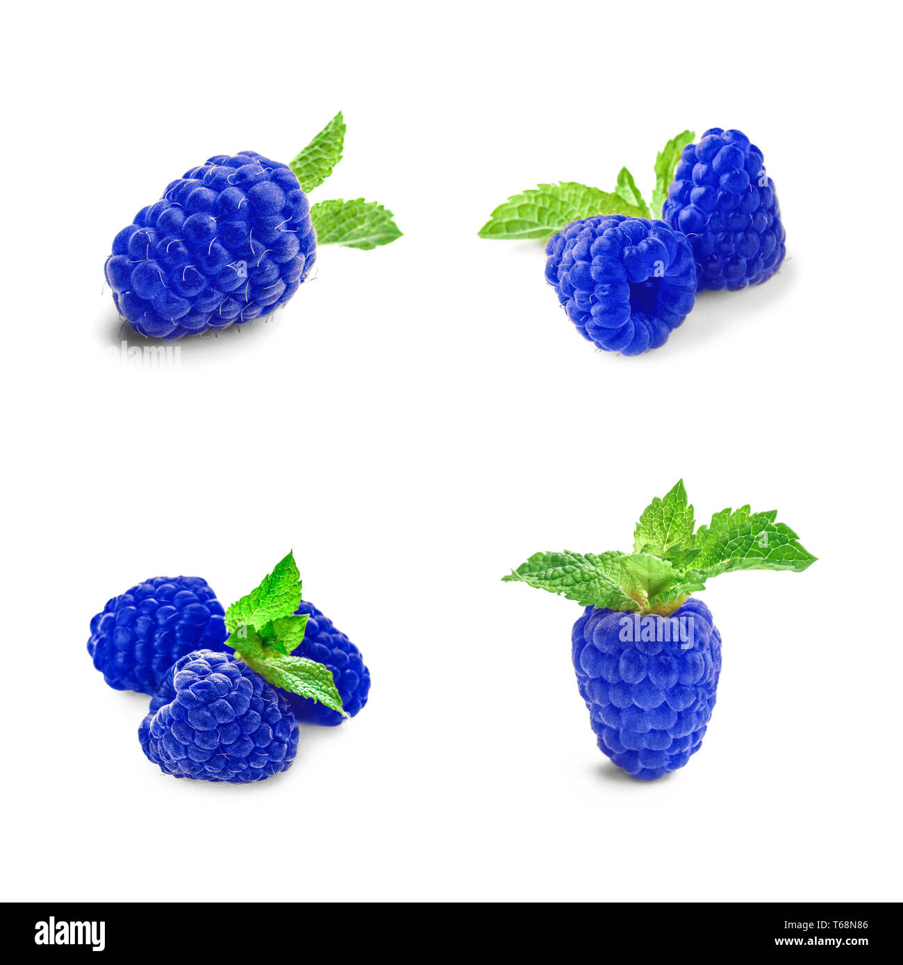 Set with fresh ripe blue raspberry on white background Stock Photo - Alamy