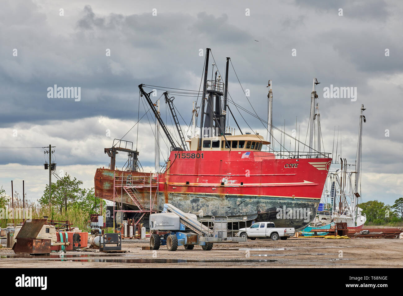Fishing boat or trawler in dry dock for repair or retrofitting in Bayou ...