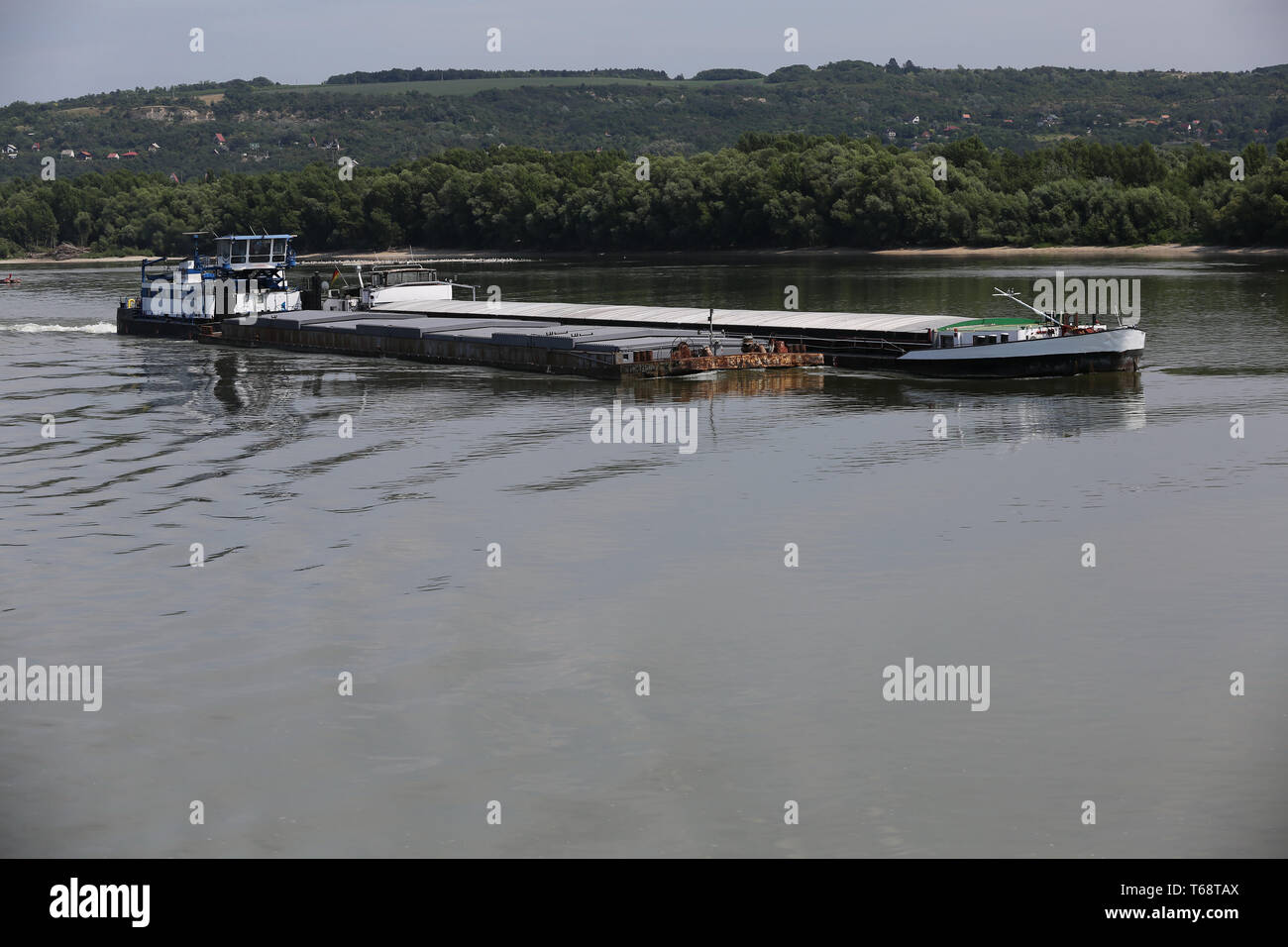 Barge floats on the river Stock Photo - Alamy