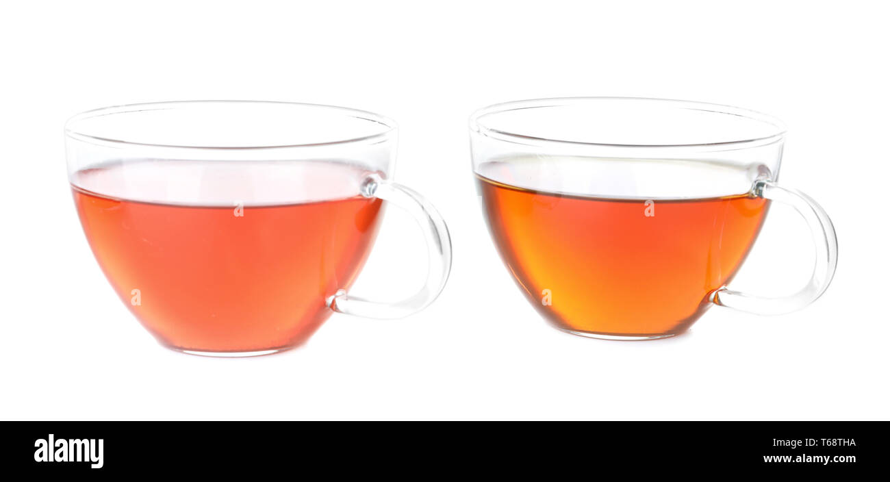 Two cups of hot aromatic tea on white background Stock Photo - Alamy
