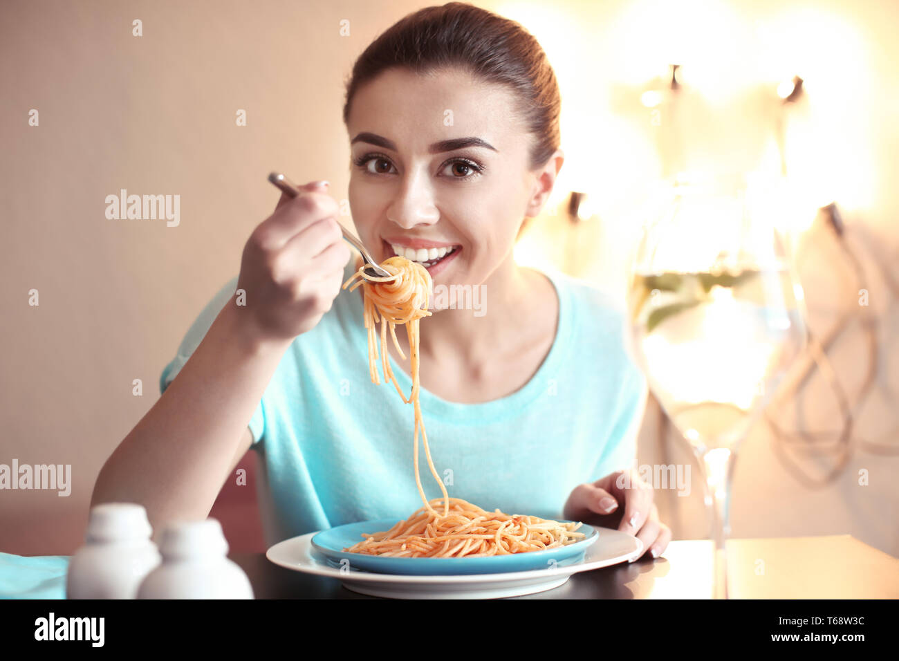 Spaghetti bolognese female adult eating hi-res stock photography and ...