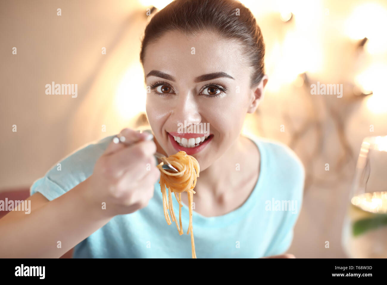 Young woman in cafe appetite hi-res stock photography and images - Alamy