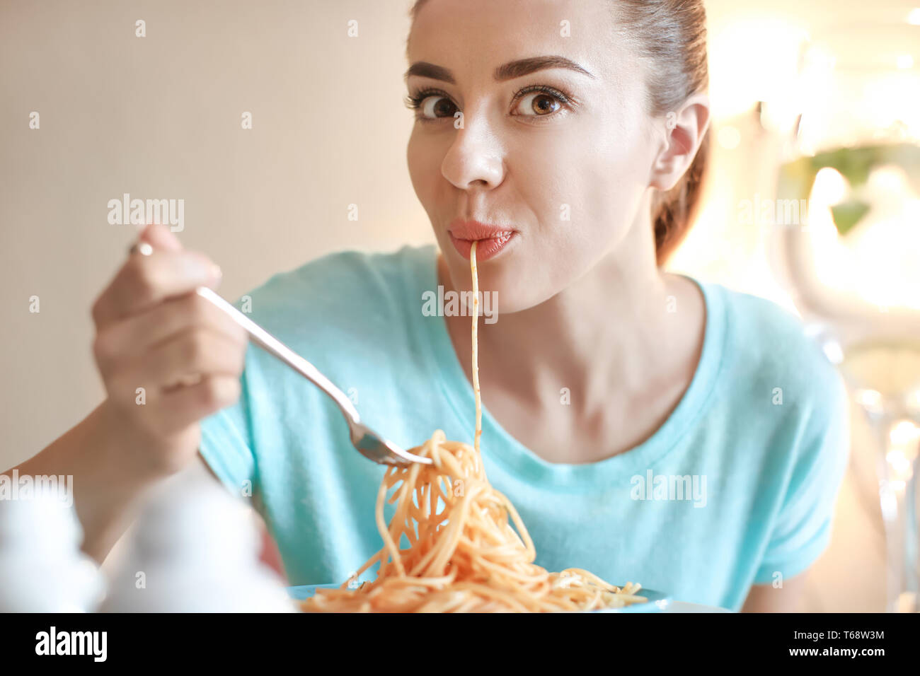 Spaghetti bolognese female adult eating hi-res stock photography and ...