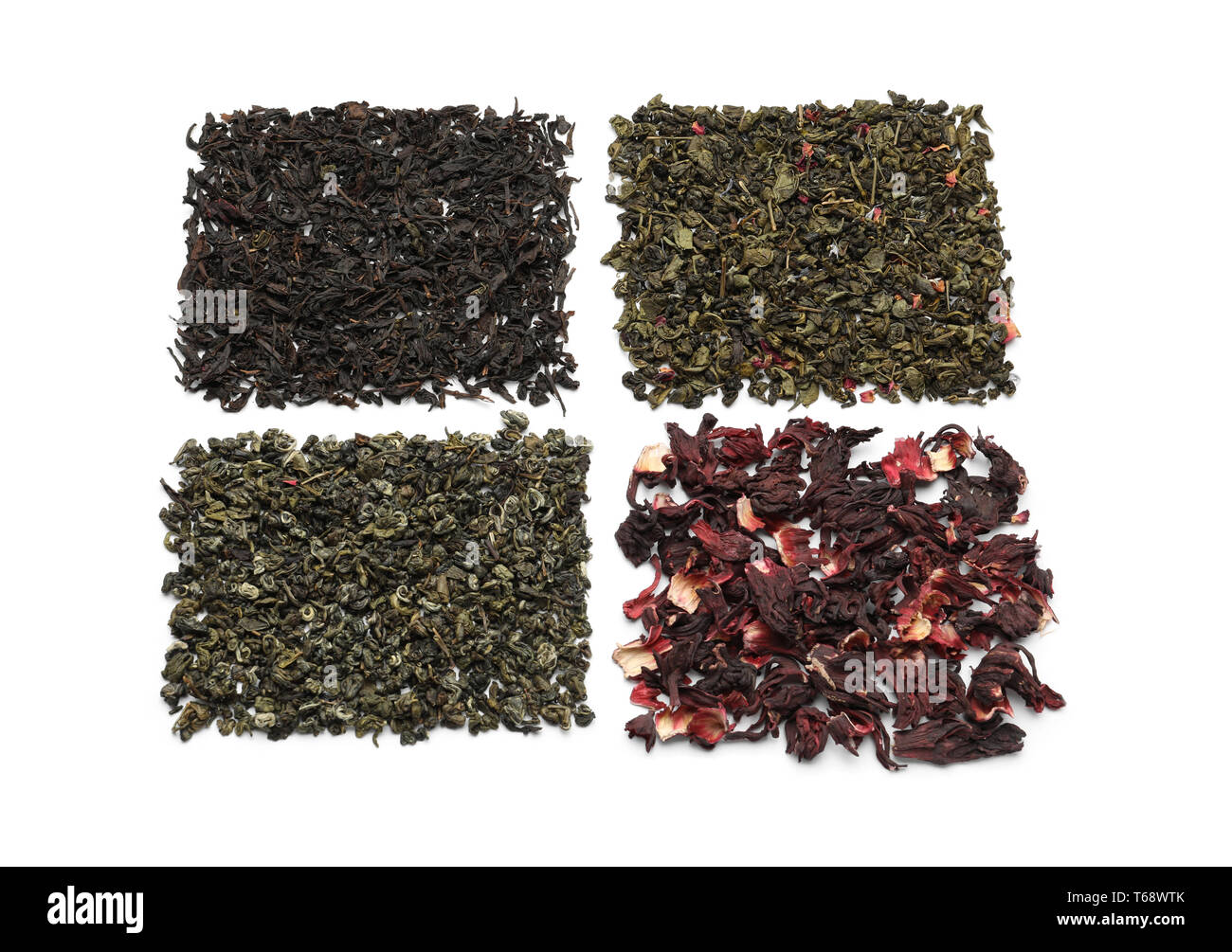 Different types of dry tea leaves on white background Stock Photo - Alamy
