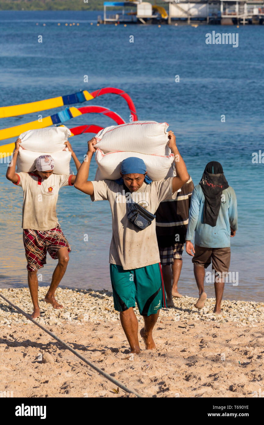 Man transports pile packaging hi-res stock photography and images - Alamy