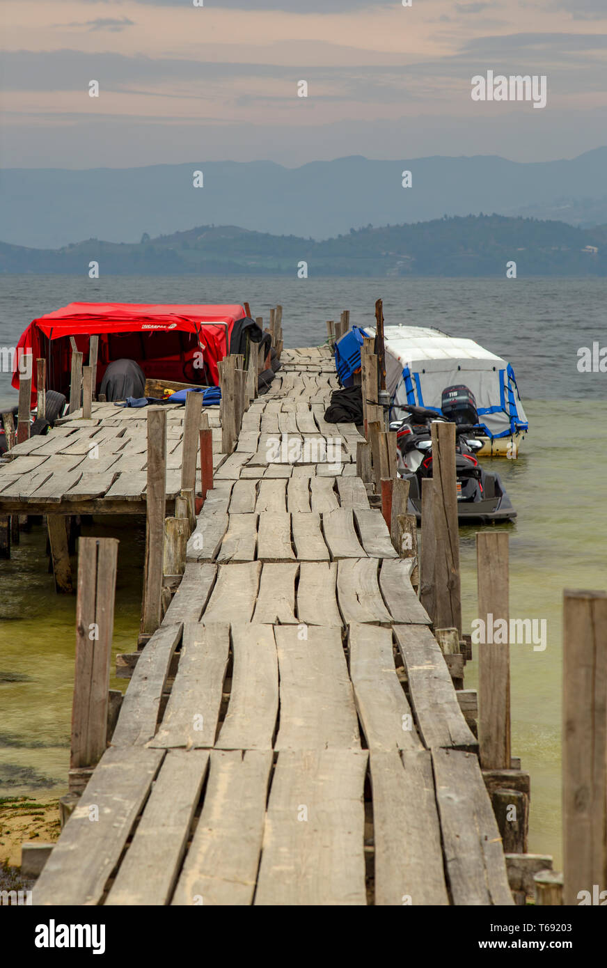 Multiple exposure of one of the wooden docks in the lake Tota, the ...