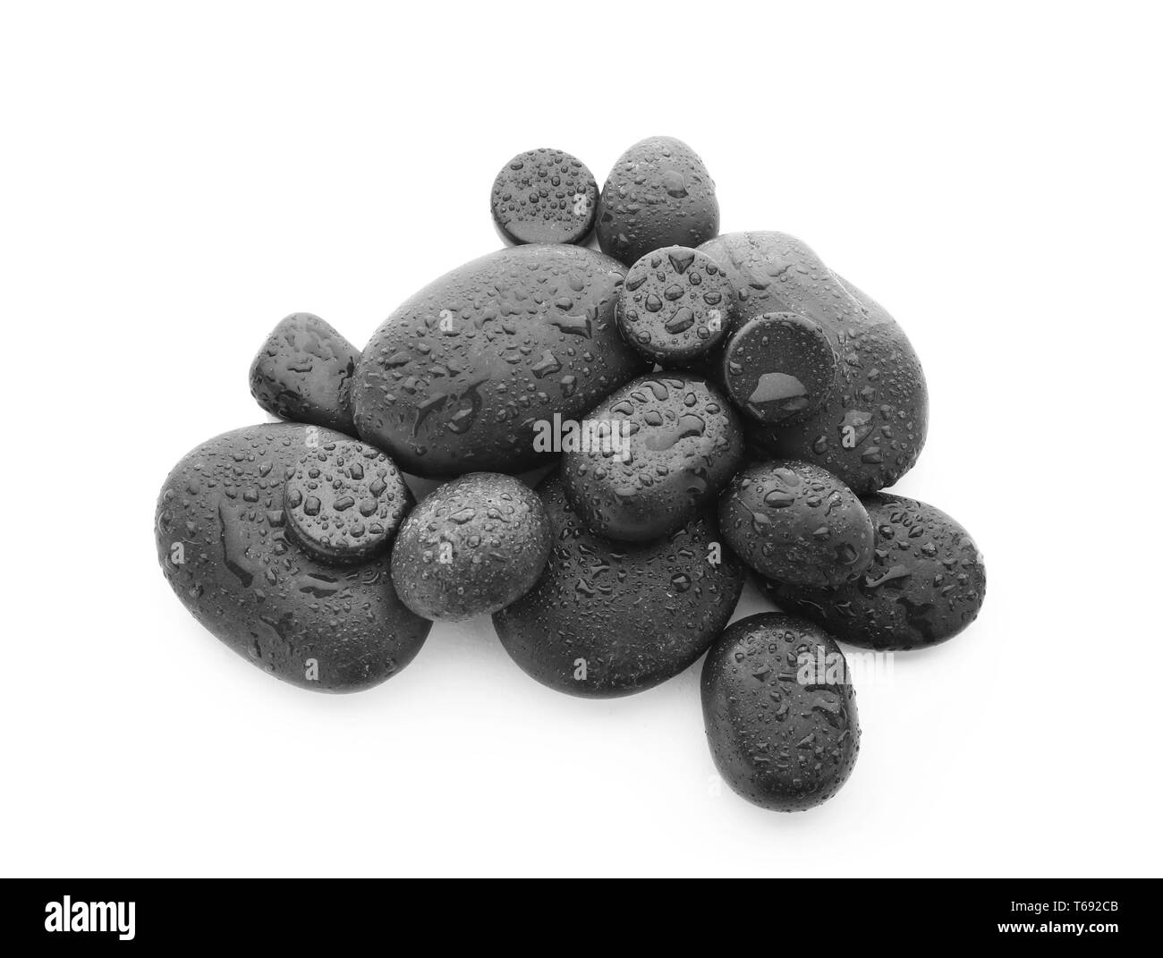 Spa stones with drops of water on white background Stock Photo - Alamy