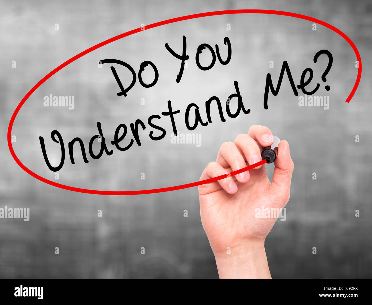 Man Hand writing Do You Understand Me? with black marker on visual ...
