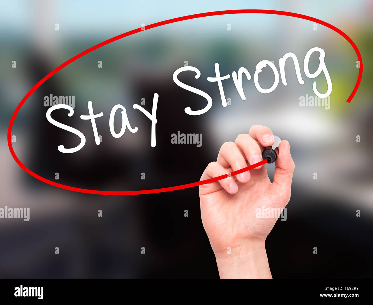 Man Hand writing Stay Strong with black marker on visual screen Stock ...