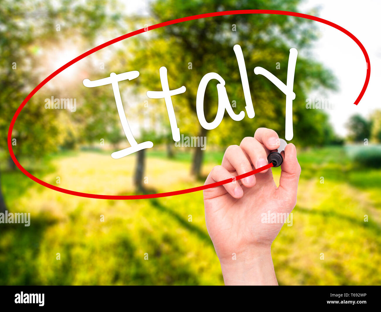 Man Hand writing Italy with black marker on visual screen Stock Photo ...