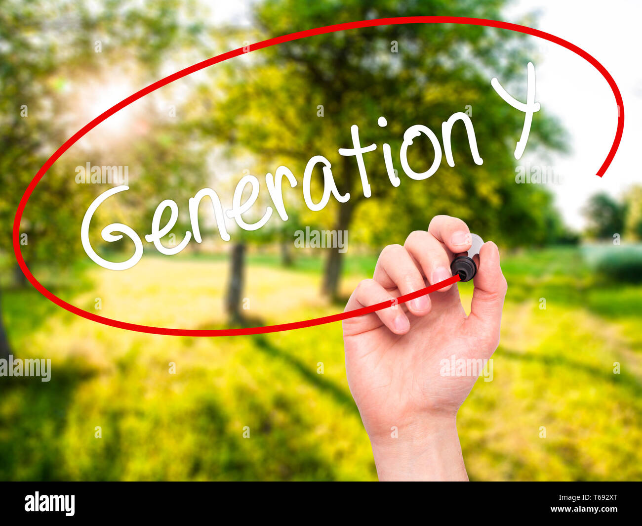 Man Hand writing Generation Y with black marker on visual screen Stock ...