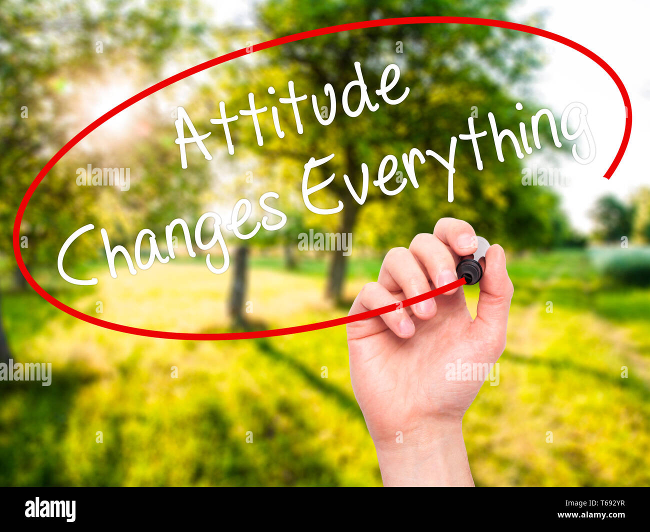Attitude changes everything writing on hi-res stock photography and ...